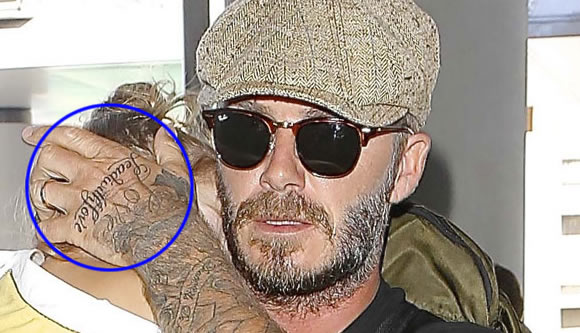 David Beckham Flashes New “Lead With Love” Hand Tattoo - Beckham Tattoos